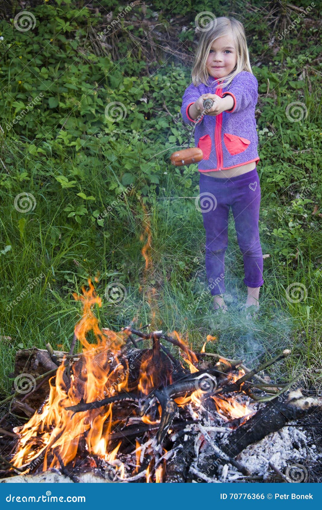 Girl Eating Sausage Cooked on Camp Fire Stock Photo - Image of roasting ...