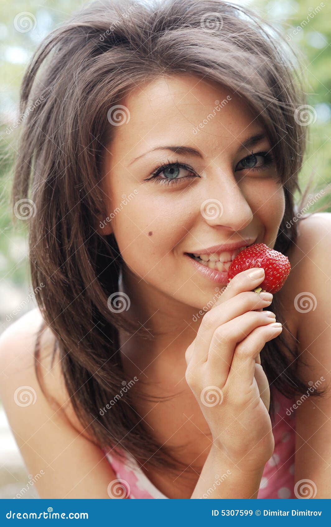 Girl eating a strawberry stock image. Image of adults - 5307599