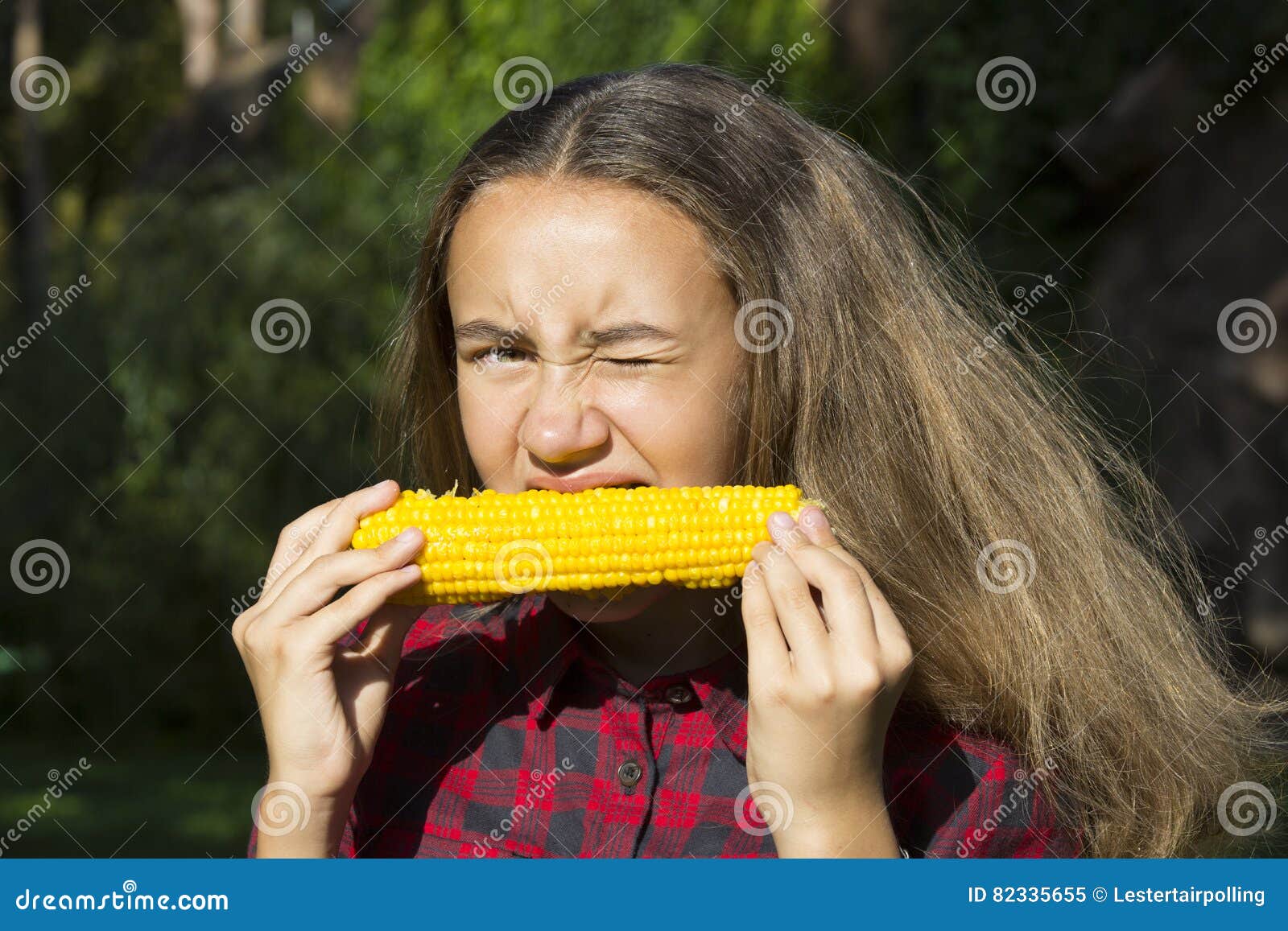 Girl eating sweet corn stock image. Image of nature, picnic - 82335655
