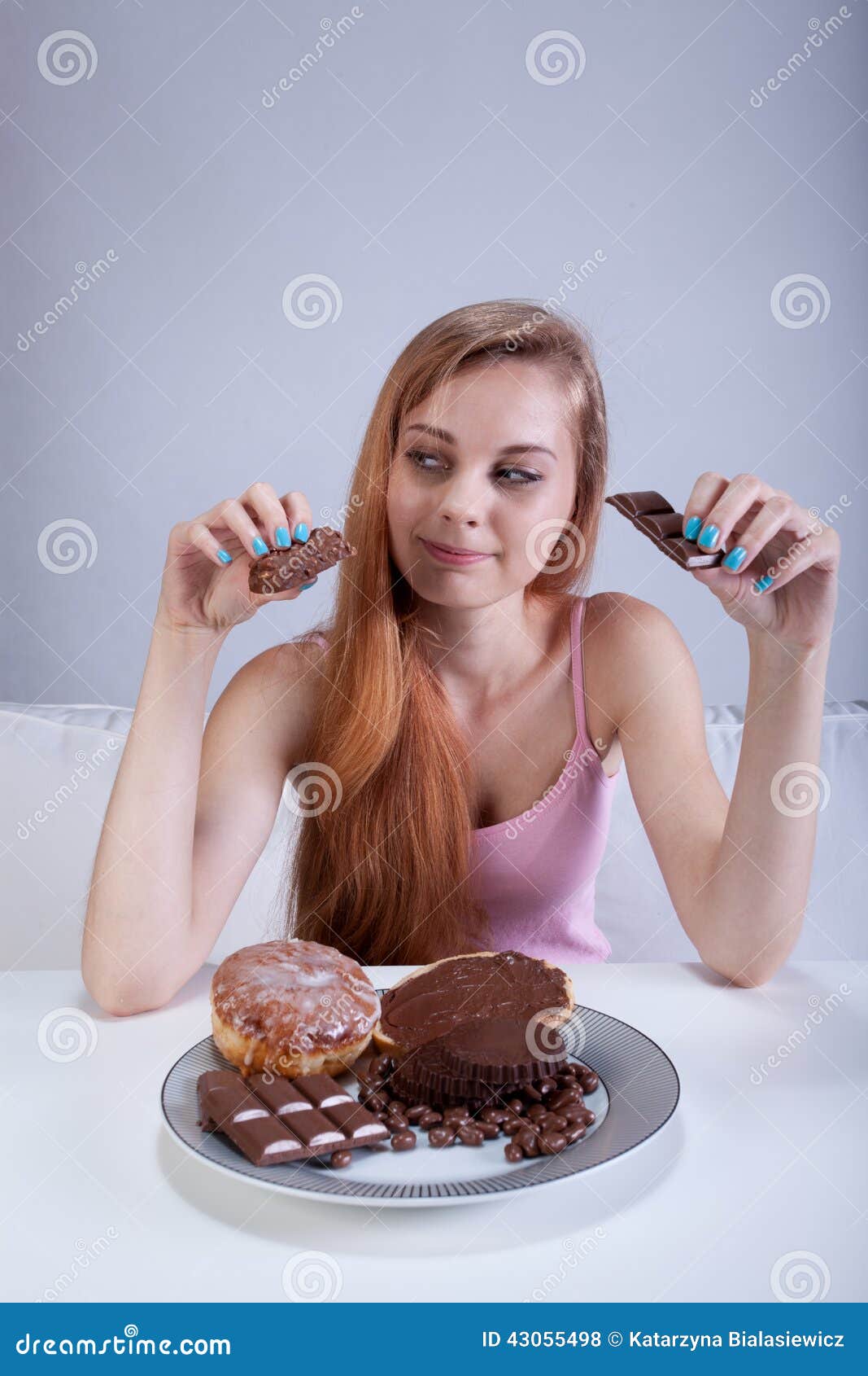 Girl eating sweets stock photo. Image of body, room, acceptance - 43055498