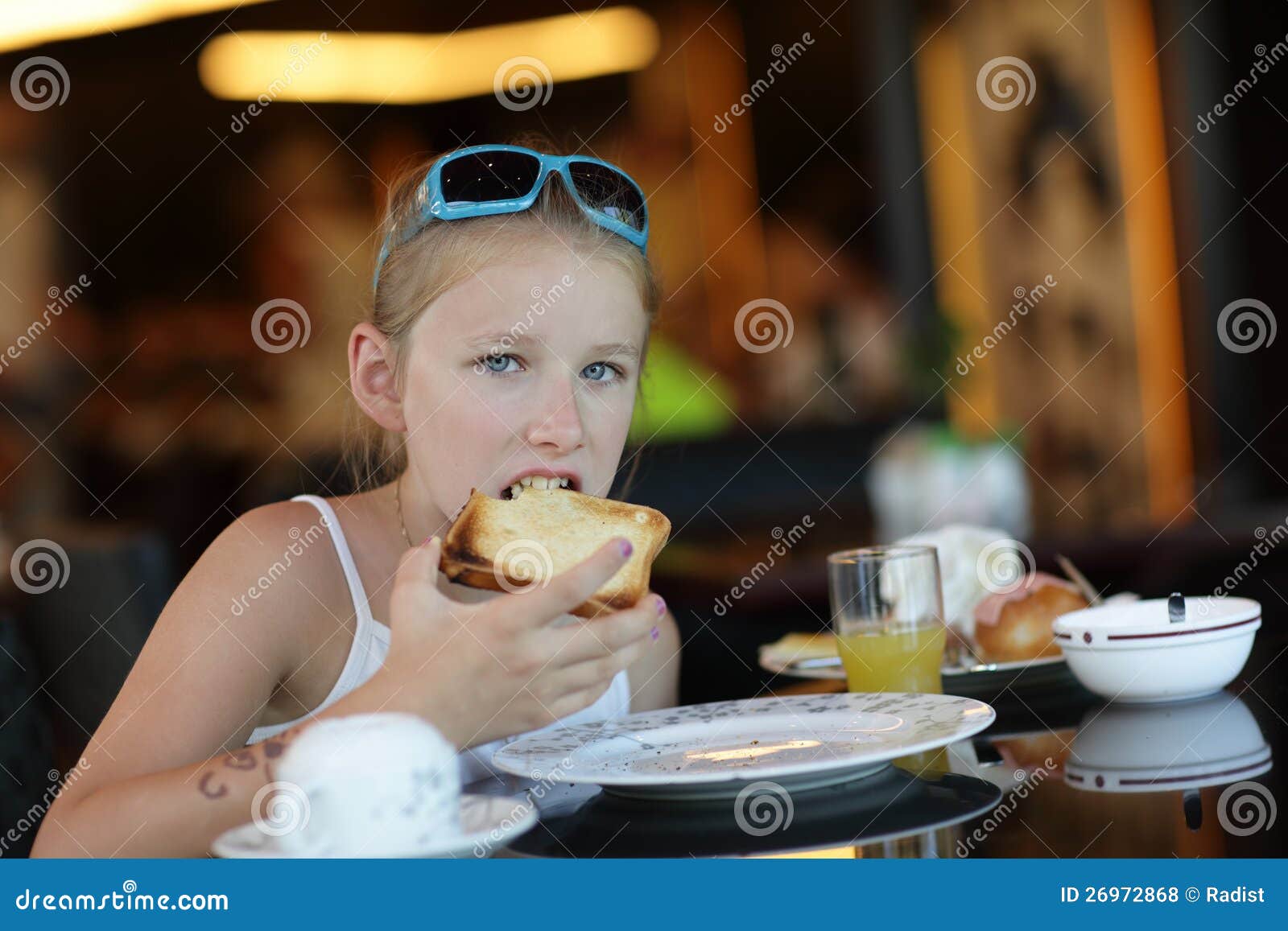 Girl eating toast stock photo. Image of healthy, crust - 26972868