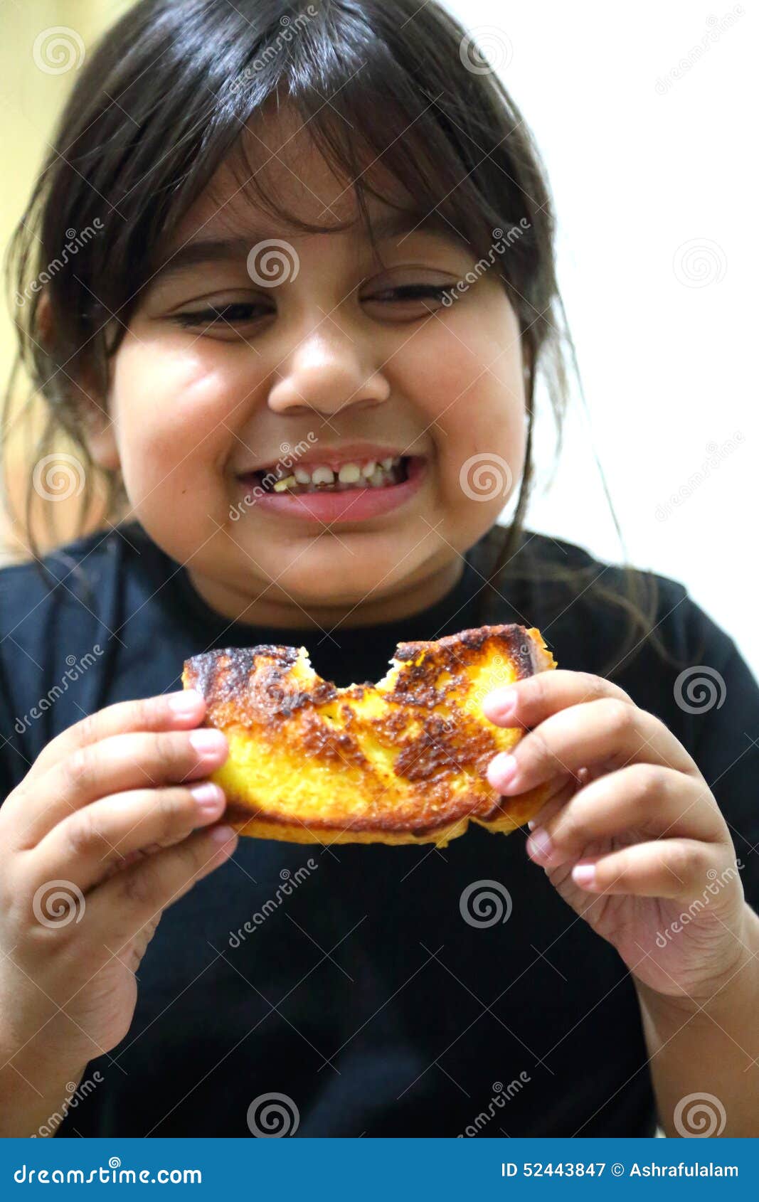 Girl Eating Toast stock image. Image of testy, joyful - 52443847