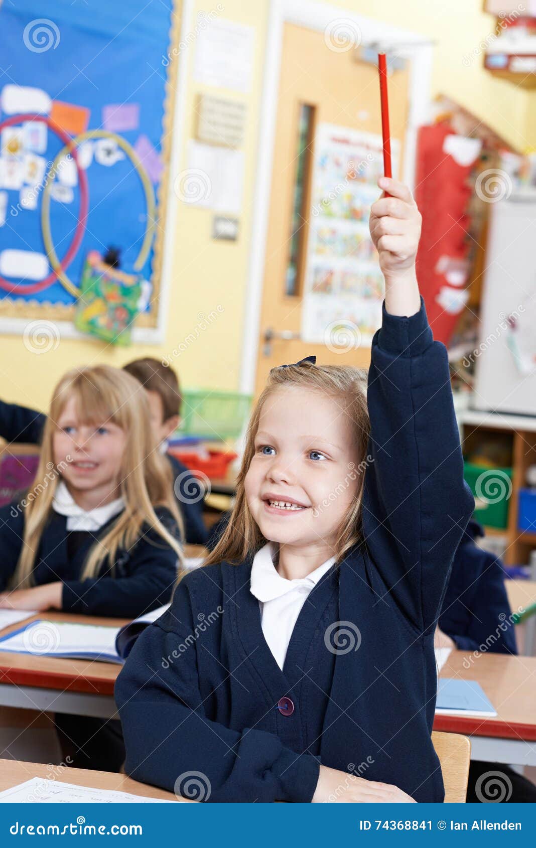 Girl in Elementary School Class Answering Question Stock Image - Image ...