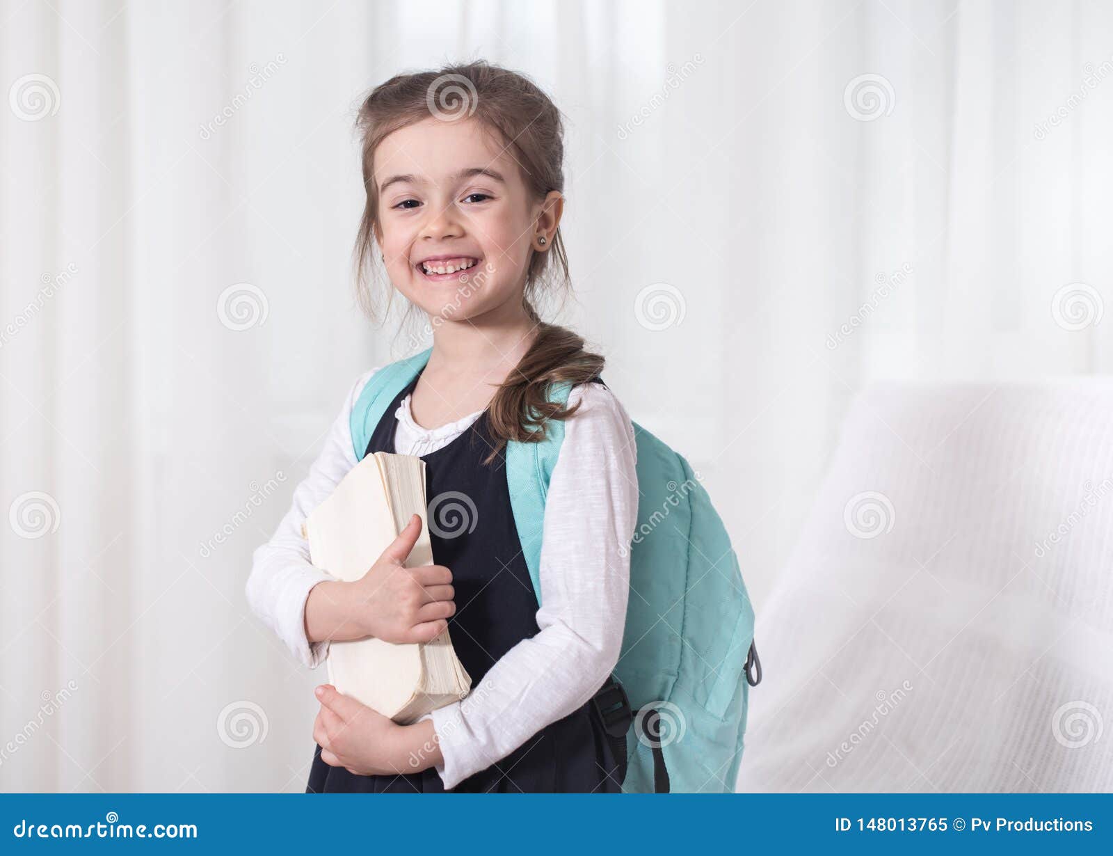 Girl-elementary School Student with a Backpack and a Book Stock Image ...