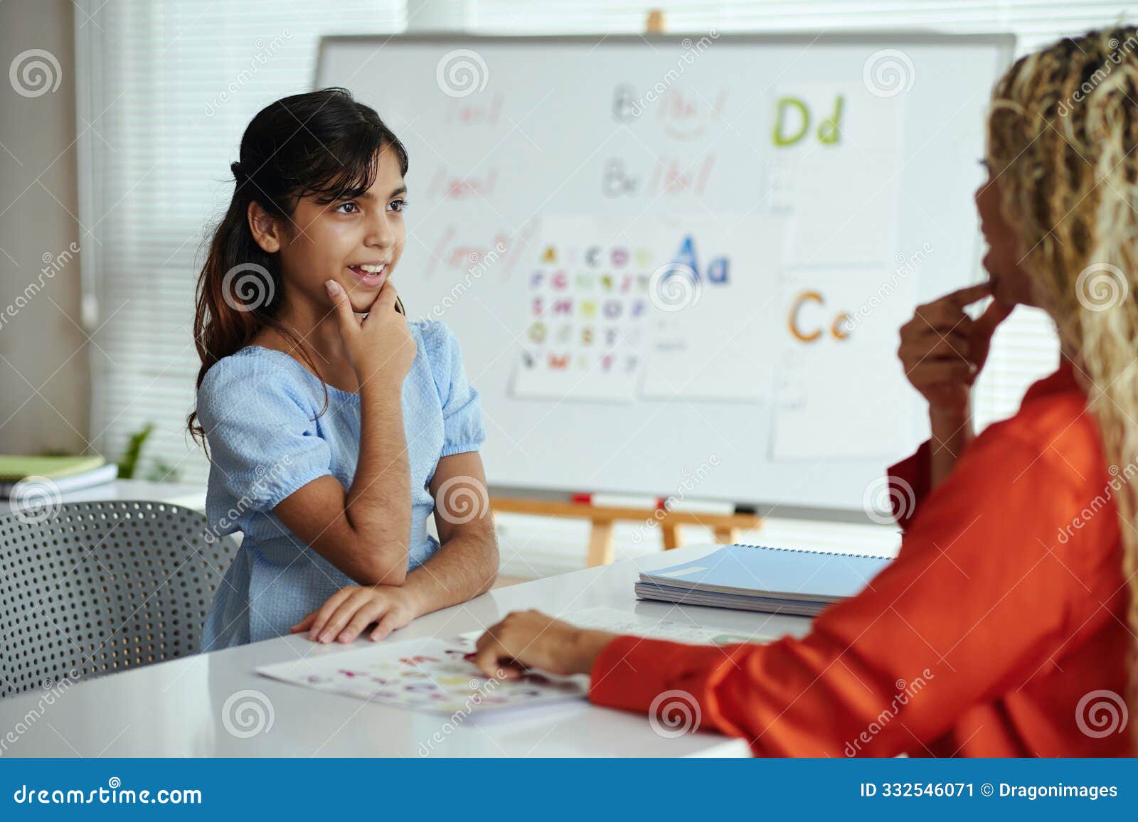 Girl Engaging in Educational Activities with Teacher Stock Image ... Girl Engaging in Educational Activities with Teacher Stock Image ...