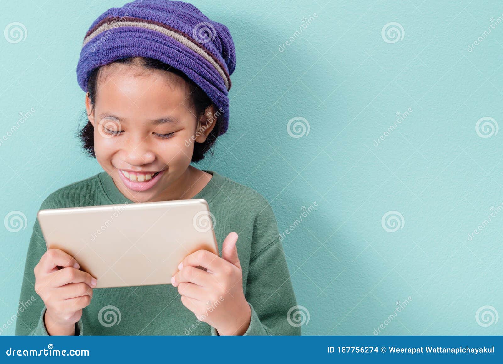 Girl Enjoy Watching Tablet stock photo. Image of online - 187756274