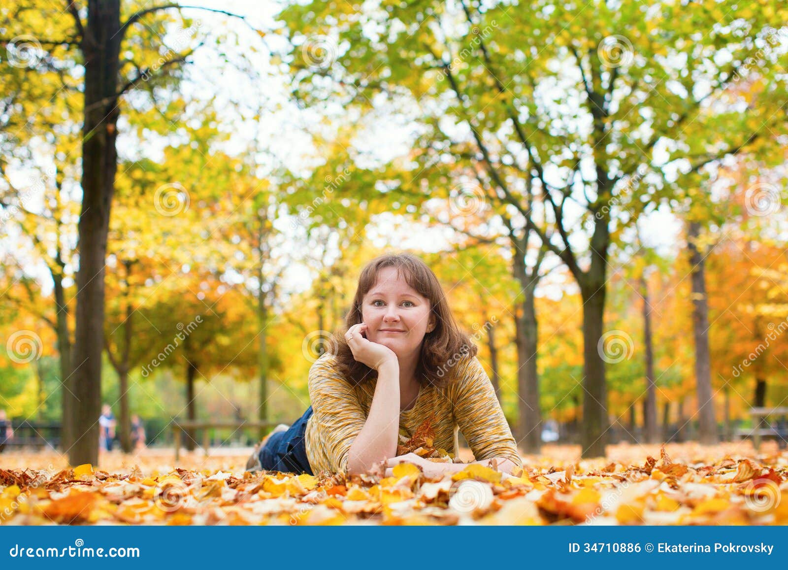 Girl Enjoying Bright Fall Day in Park Stock Photo - Image of caucasian ...