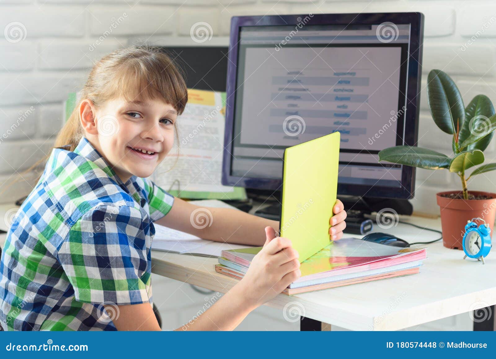 Girl Enjoys Doing Homework at the Computer Stock Photo - Image of ...