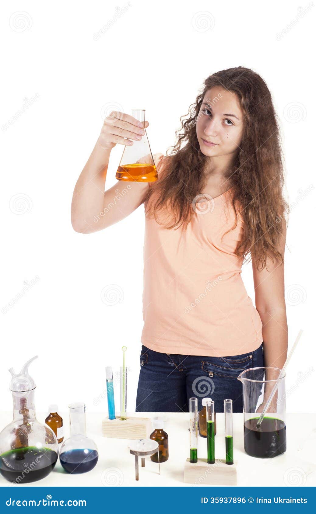 Girl examining a test tube stock photo. Image of school - 35937896