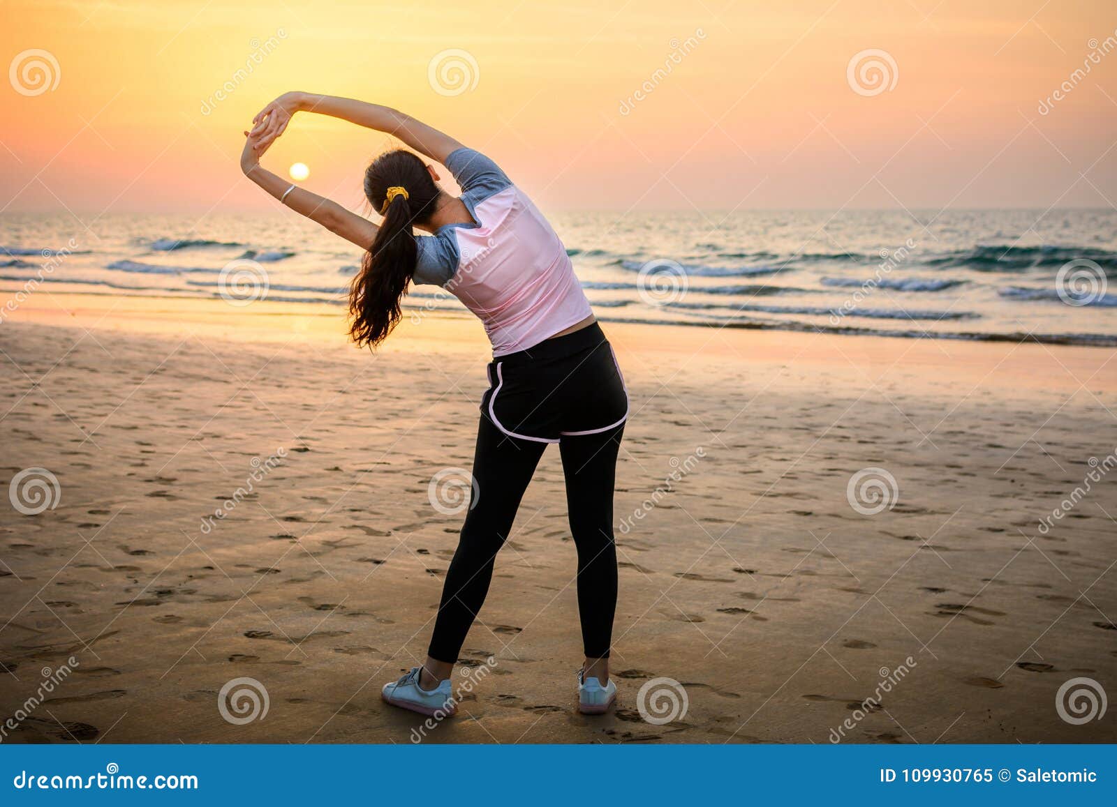 Girl Exercising on the Beach at Sunset Stock Image - Image of standing ...
