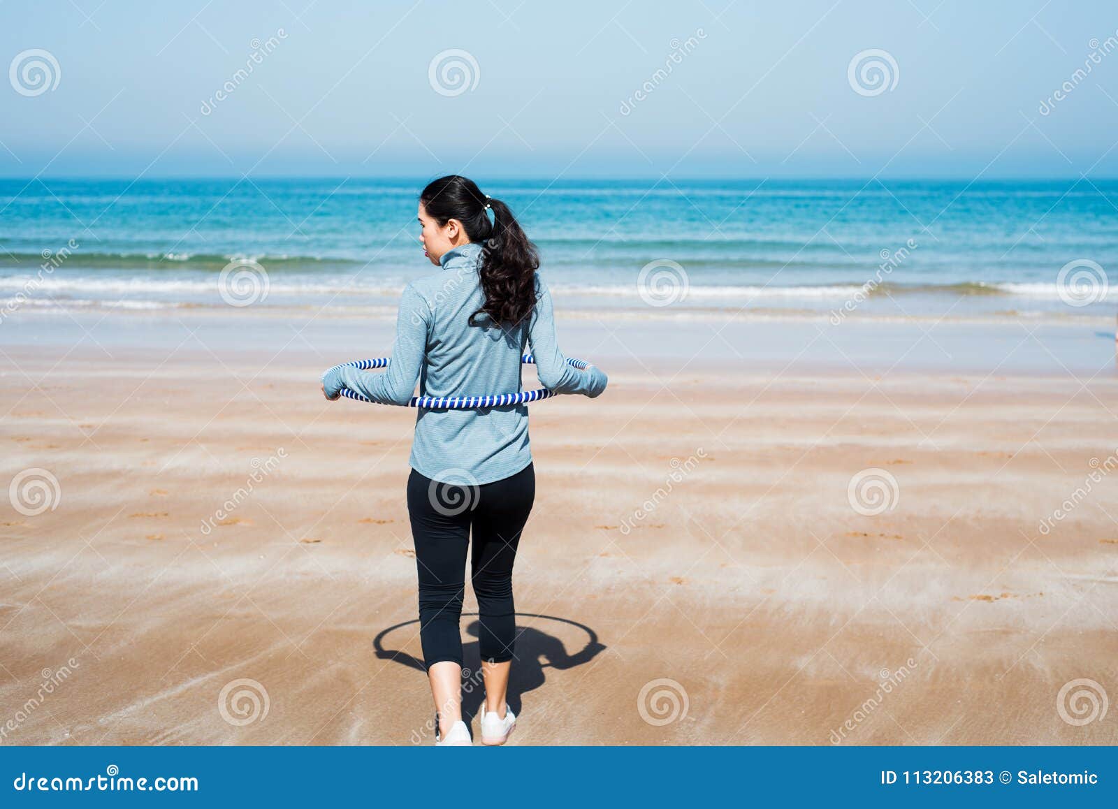 Girl Exercising with Hula Hoop on the Beach Stock Image - Image of ...