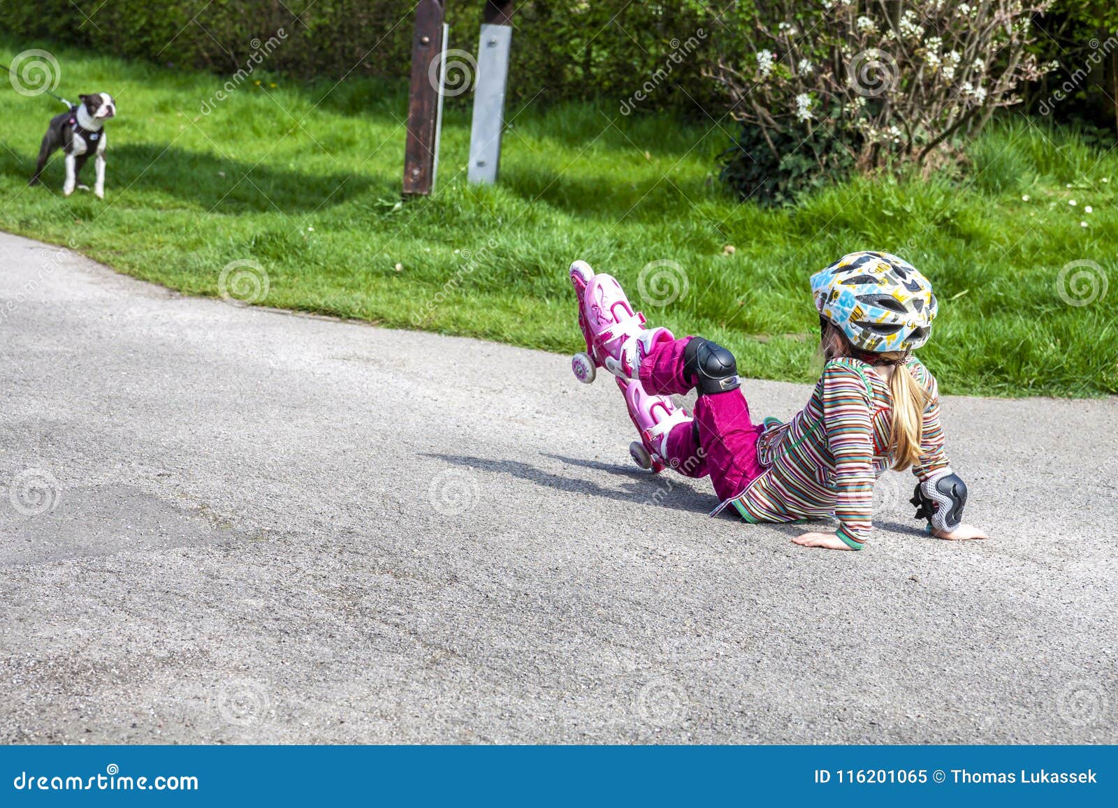 Girl Falling in the Street with Her Rollers Stock Image - Image of ...