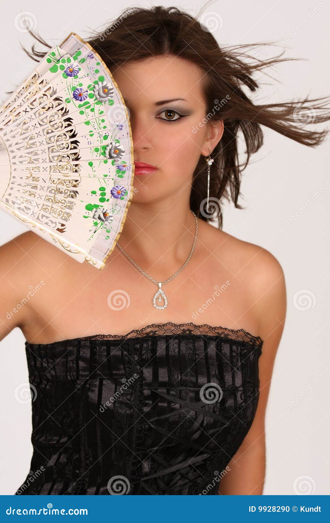 Girl with Fan Over Her Face Stock Photo - Image of person, black: 9928290