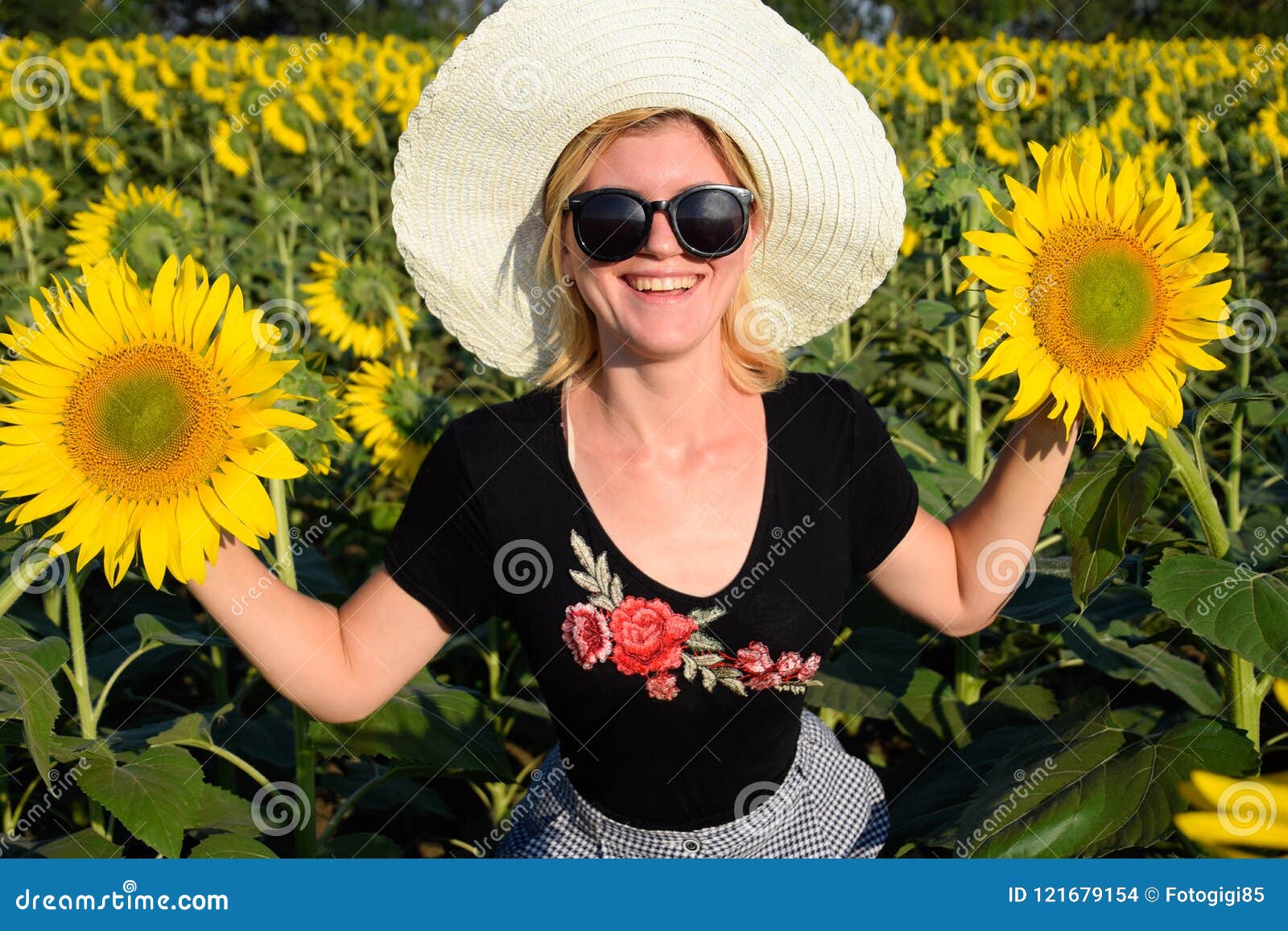 Girl On The Field Of Sunflowers Girl With Sunglasses And A White Hat