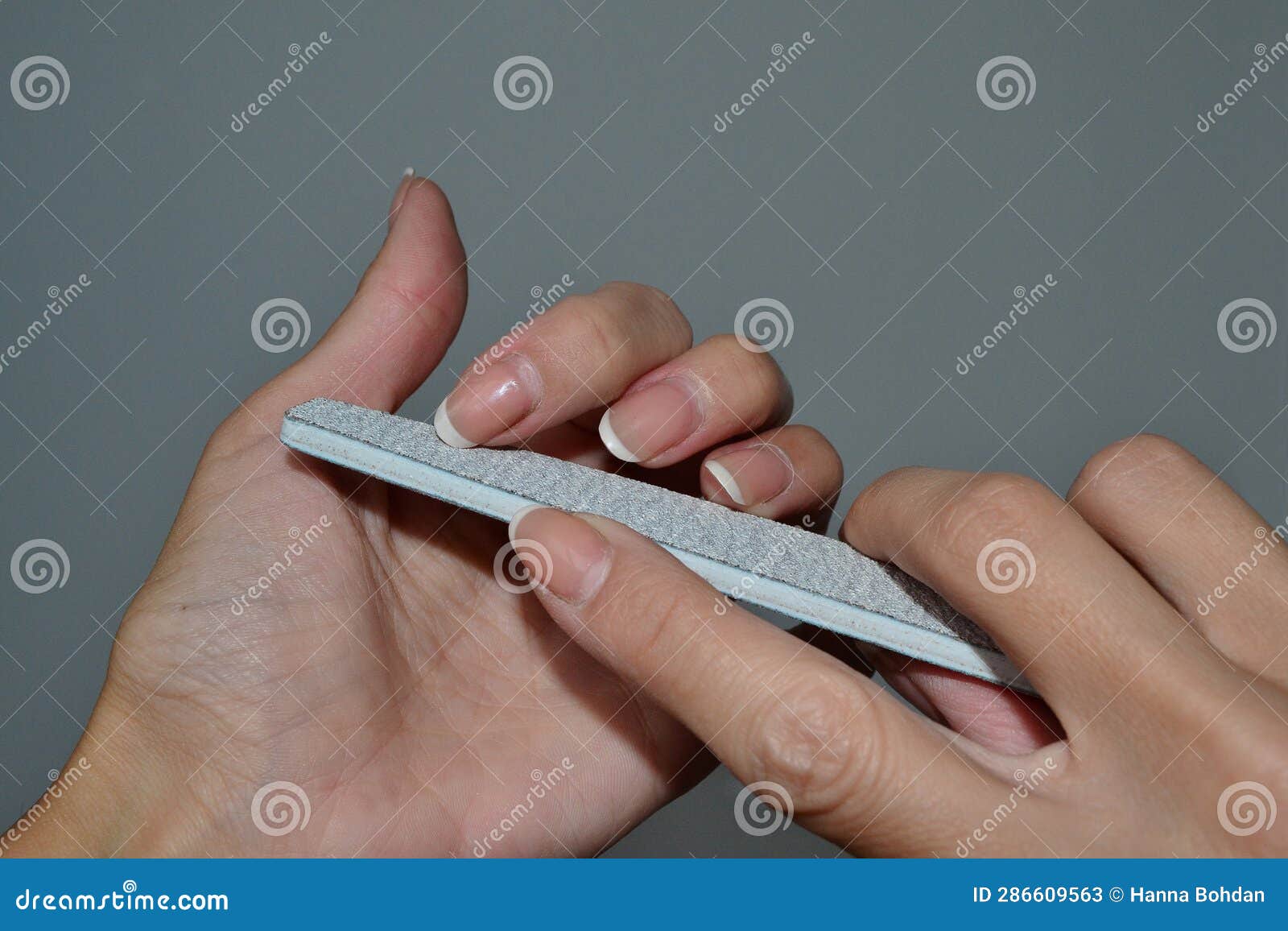 The Girl is Filing Her Nails Stock Image - Image of closeup, girl ...