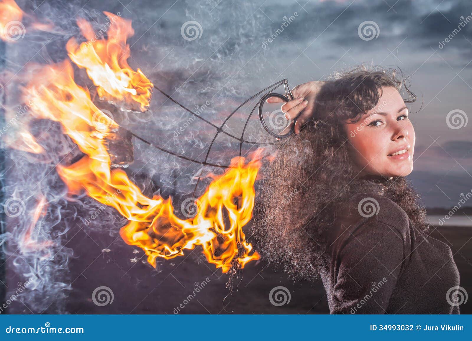 The girl and fire stock photo. Image of equipment, black - 34993032