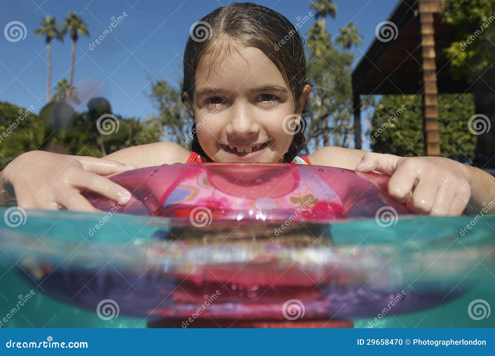 Girl Floating on Inflatable Ring Stock Photo - Image of childhood ...