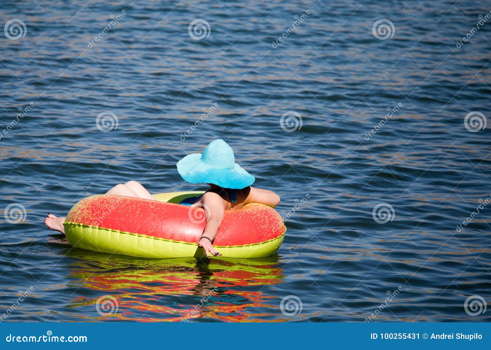 The Girl is Floating on a Tank on the Lake Stock Image - Image of happy ...