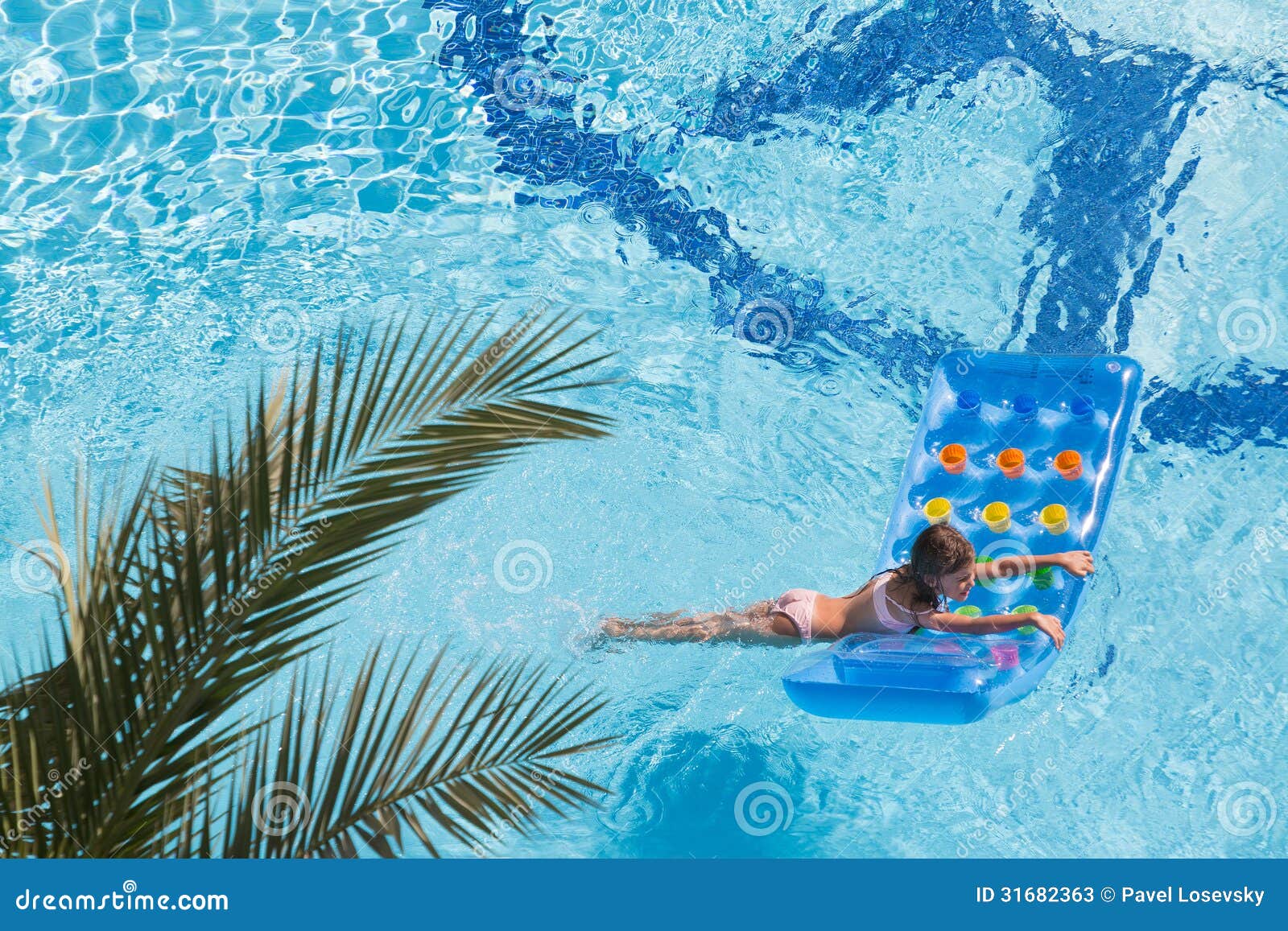 A Girl Floats on Inflatable Colored Mattress Stock Image - Image of ...
