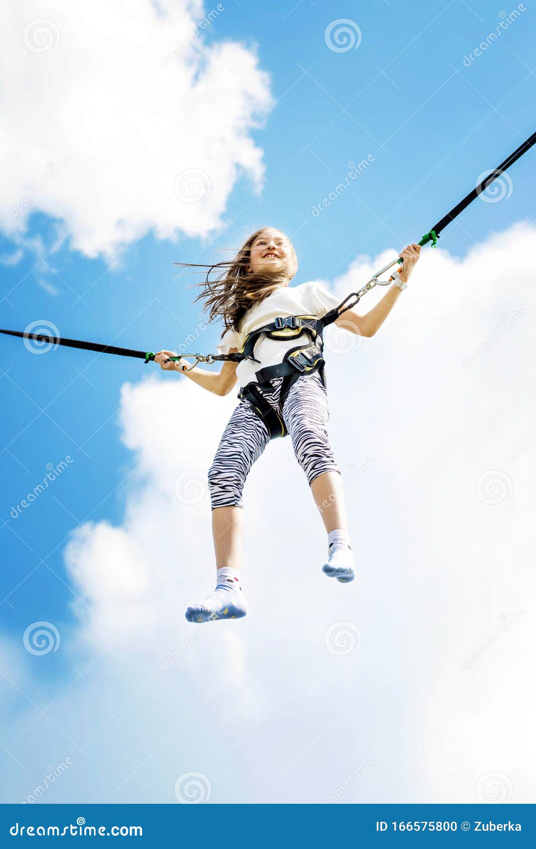 Girl Flying High on Bungee stock photo. Image of authentic - 166575800