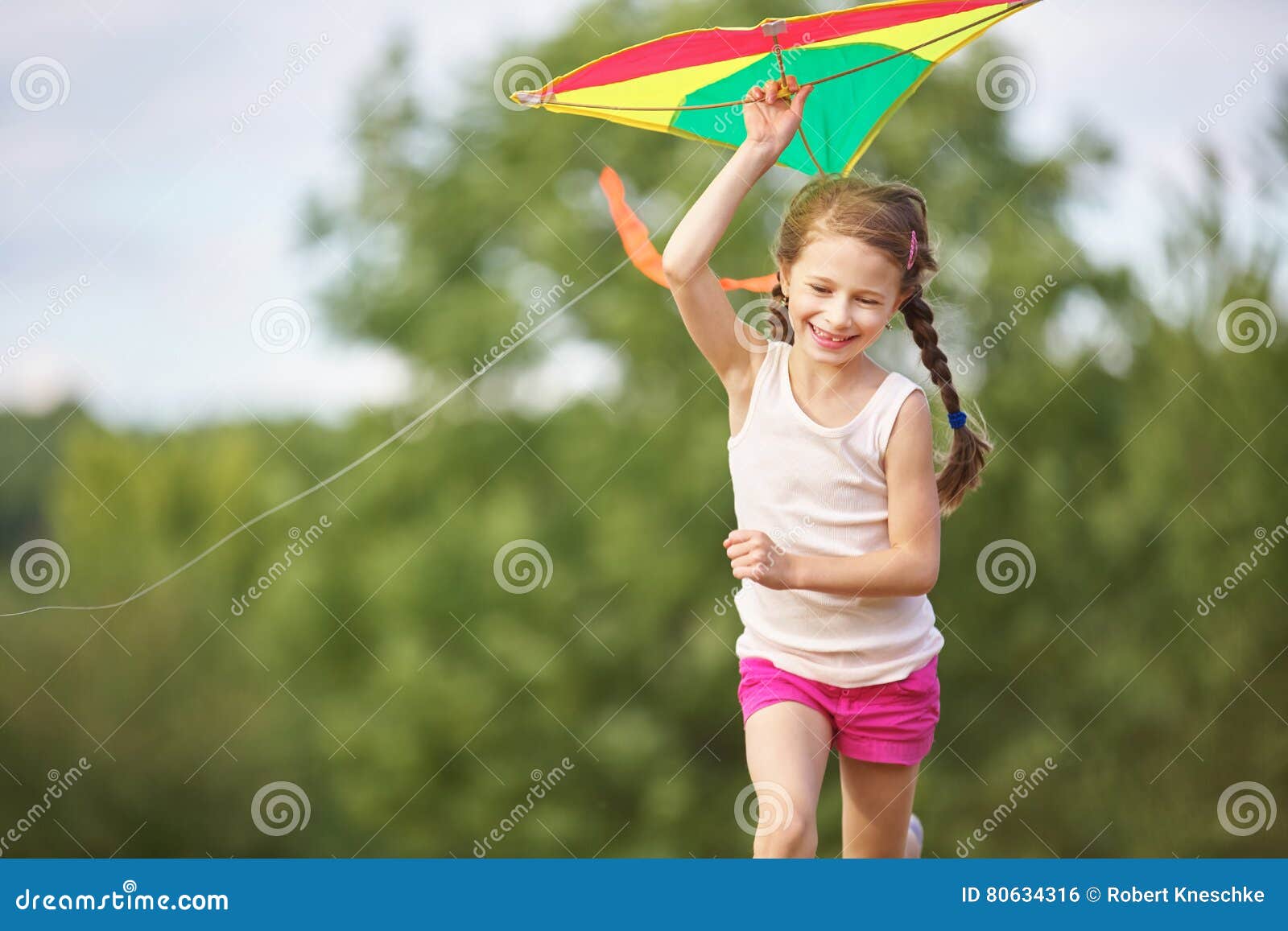 Girl flying a kite stock photo. Image of autumn, leisure - 80634316