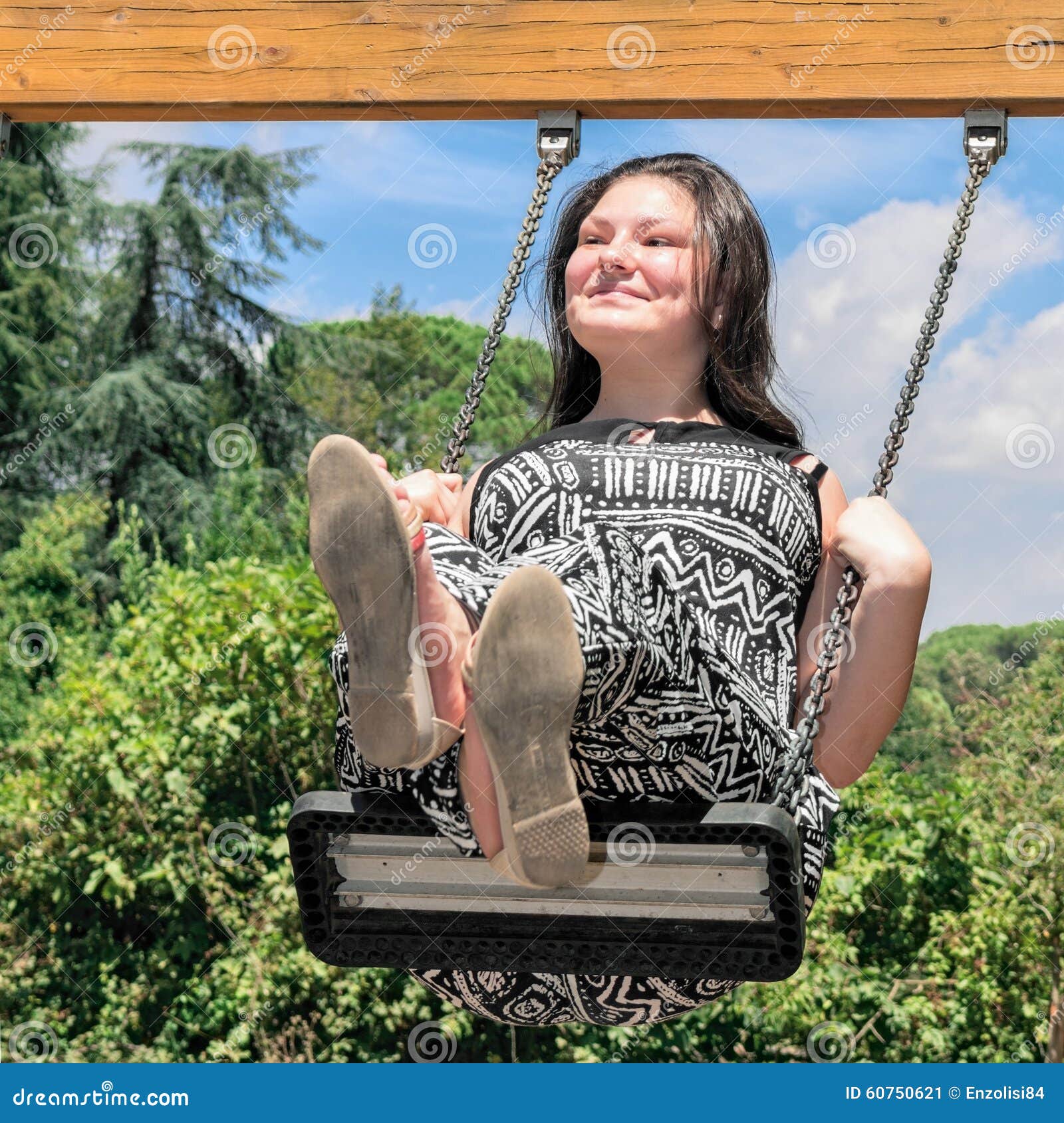 Girl flying on the swing stock image. Image of playful - 60750621
