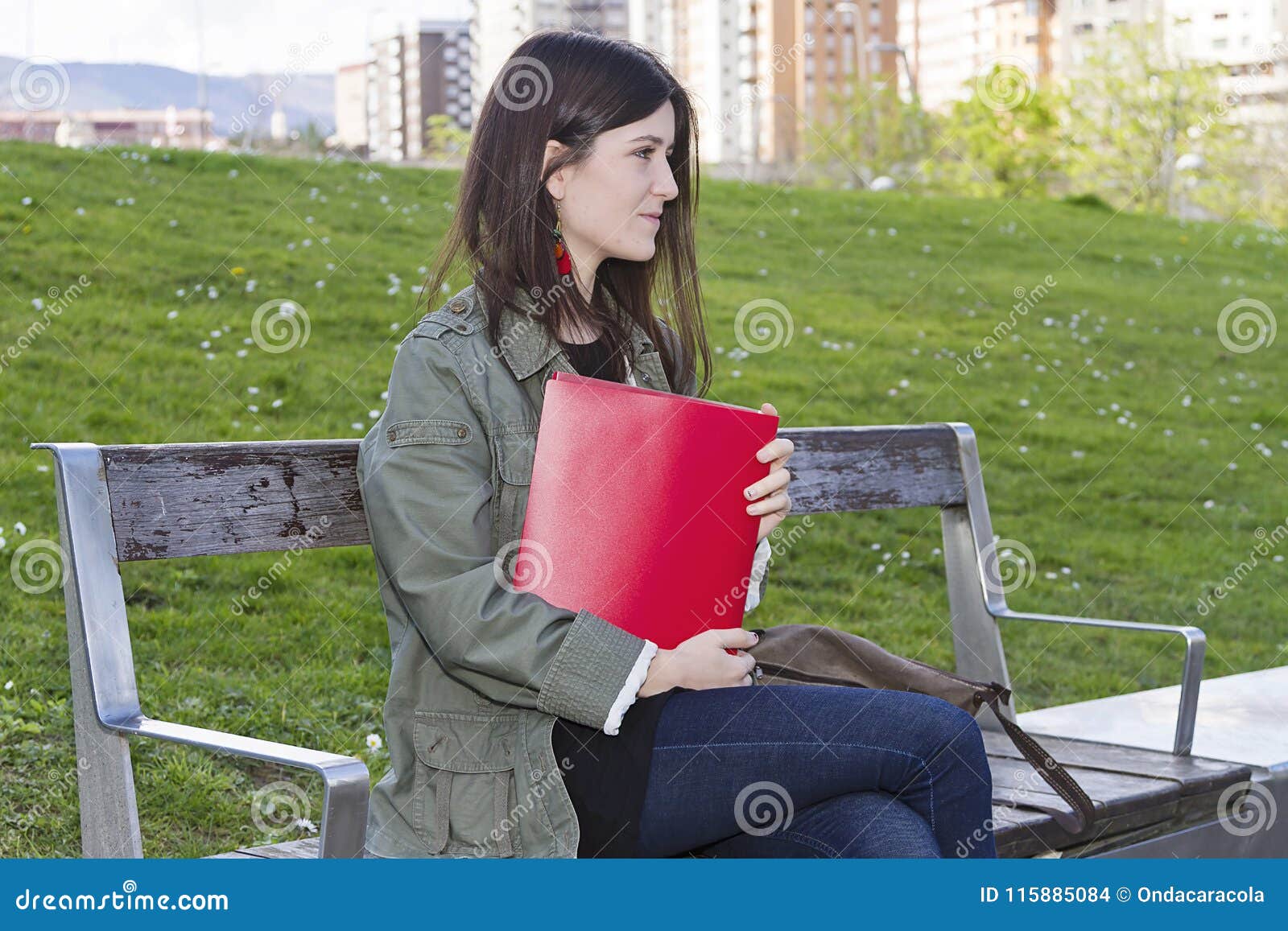 A girl with a folder stock photo. Image of shopper, retail - 115885084
