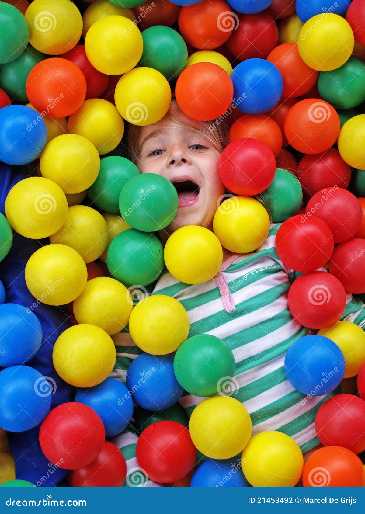 Girl in fun balls stock photo. Image of colorful, playgrounds - 21453492