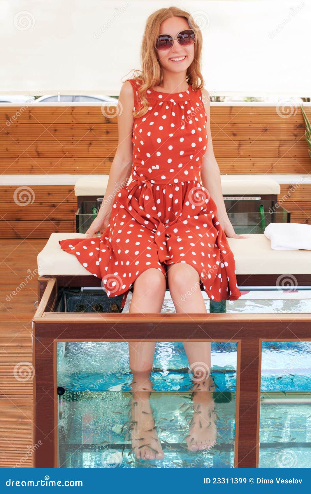 Girl gets fish spa stock image. Image of female, body - 23311399