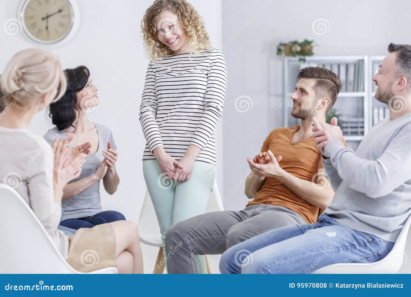 Girl getting applause stock photo. Image of meeting, community - 95970808