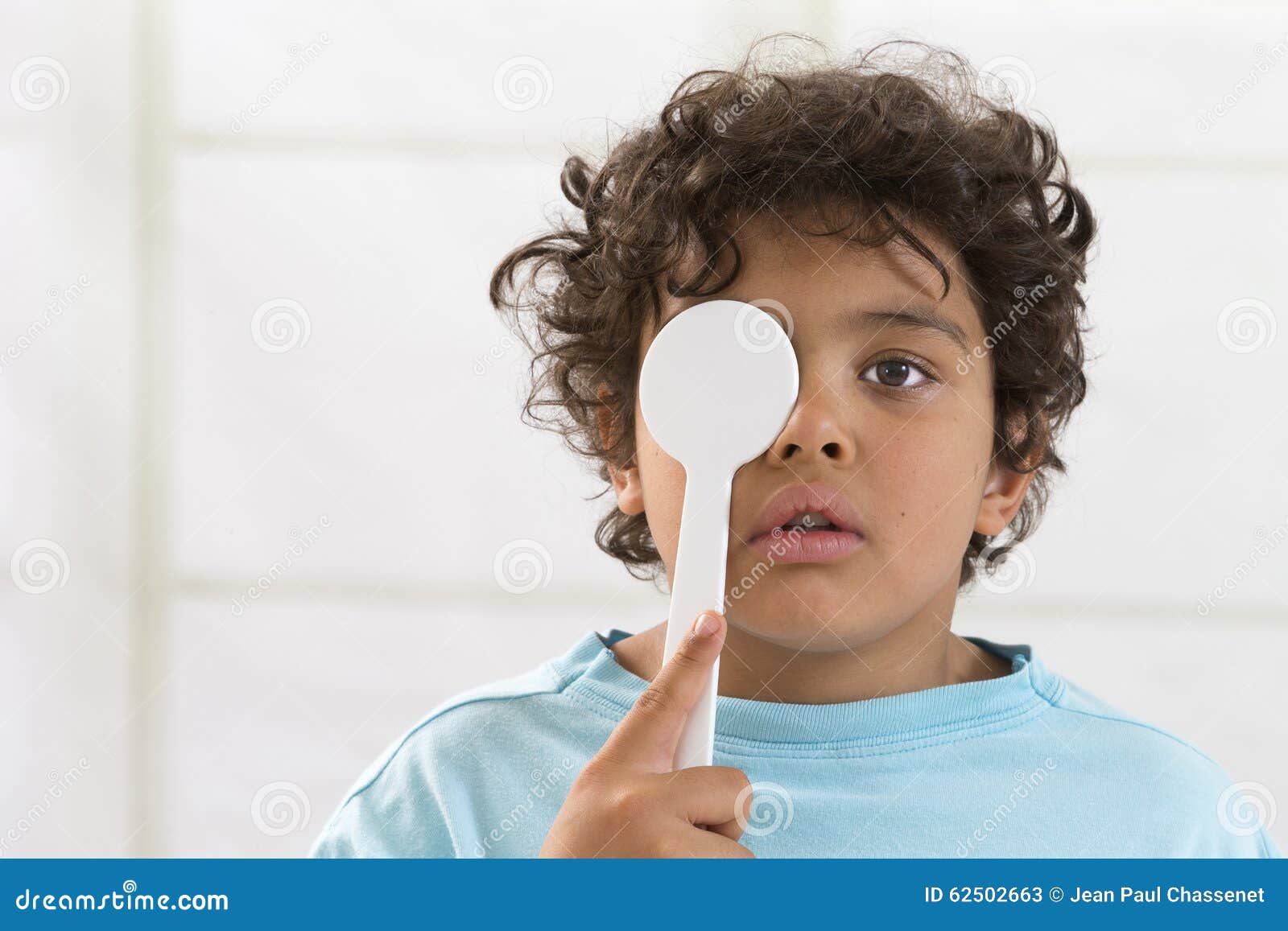 Girl getting eye exam stock image. Image of oculist, happy - 62502663