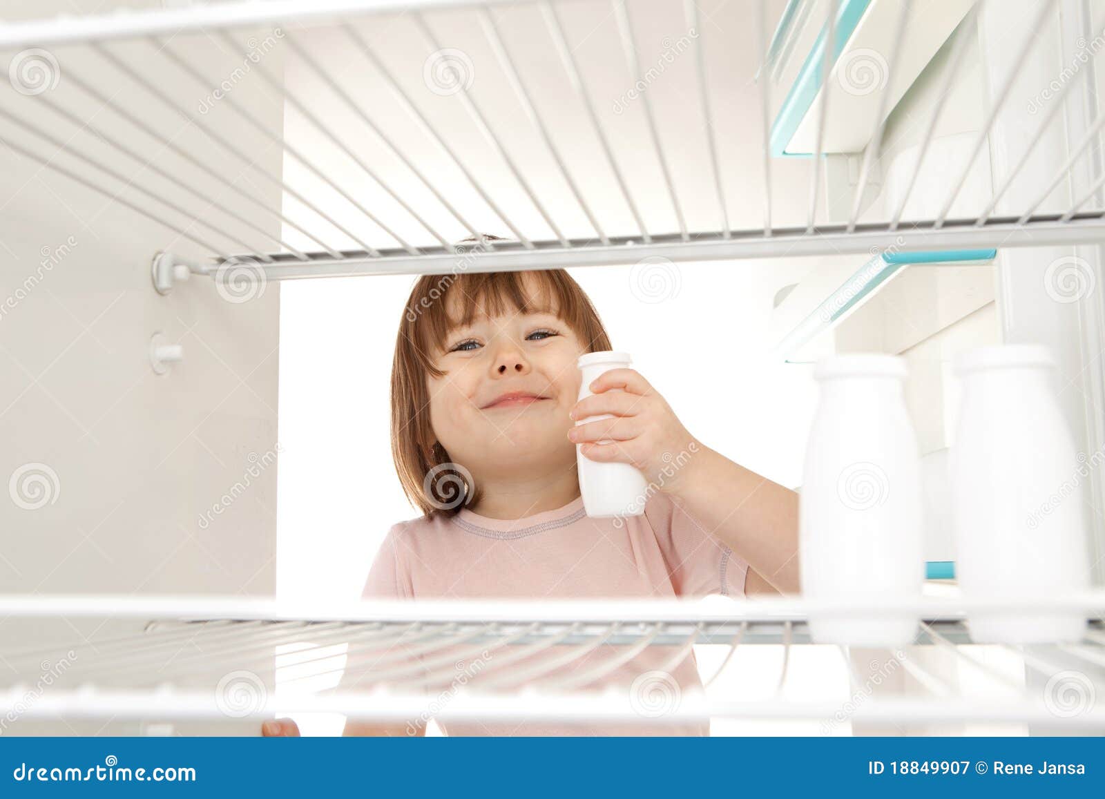 Girl getting milk stock image. Image of food, drink, snack - 18849907