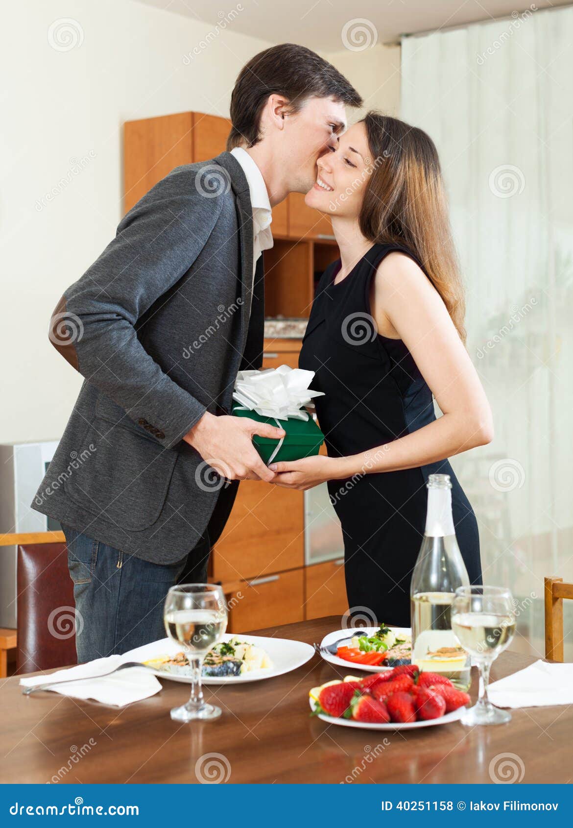 Girl giving present to man stock photo. Image of drink - 40251158