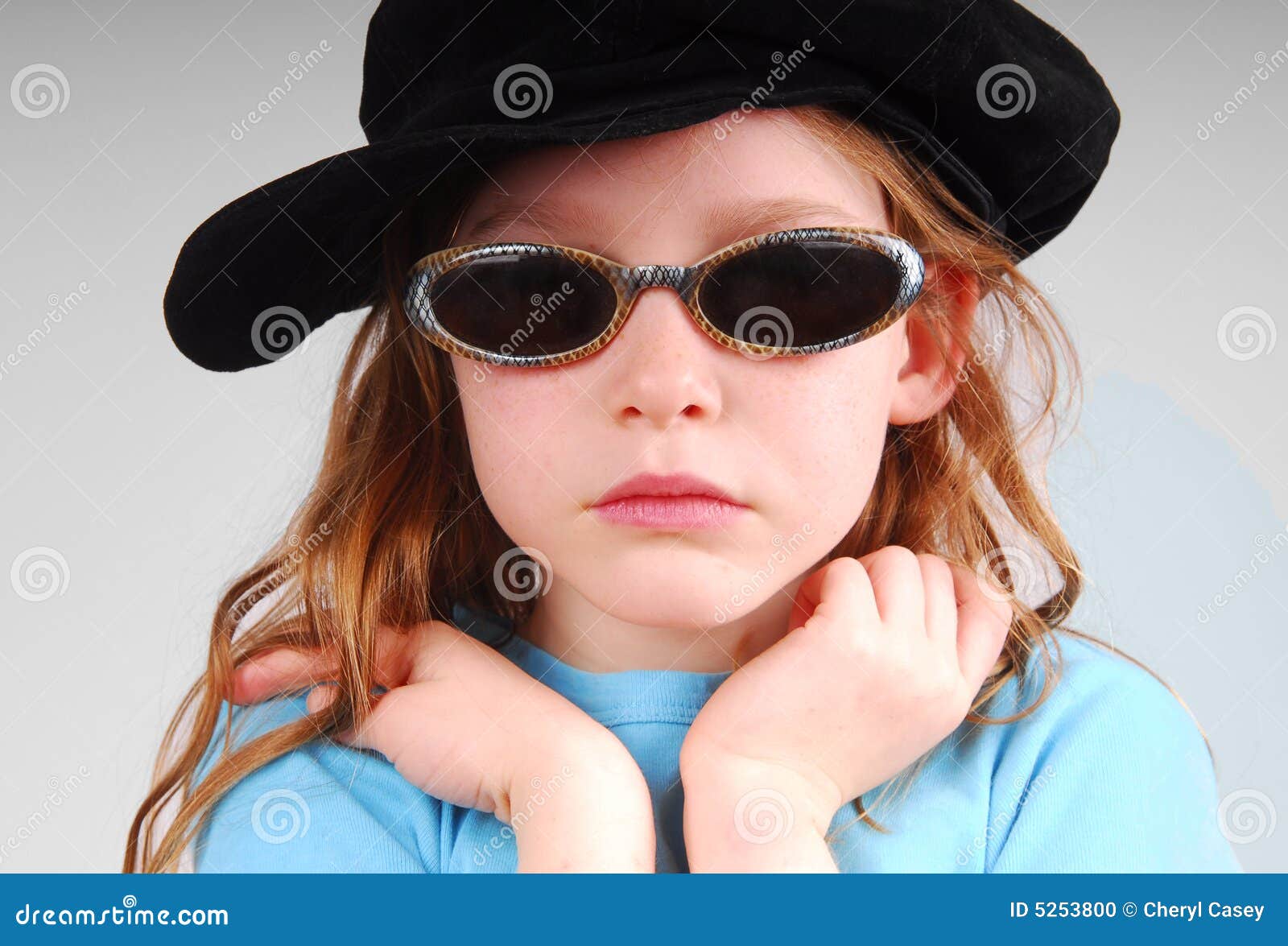 Girl in glasses and hat stock photo. Image of expressive - 5253800