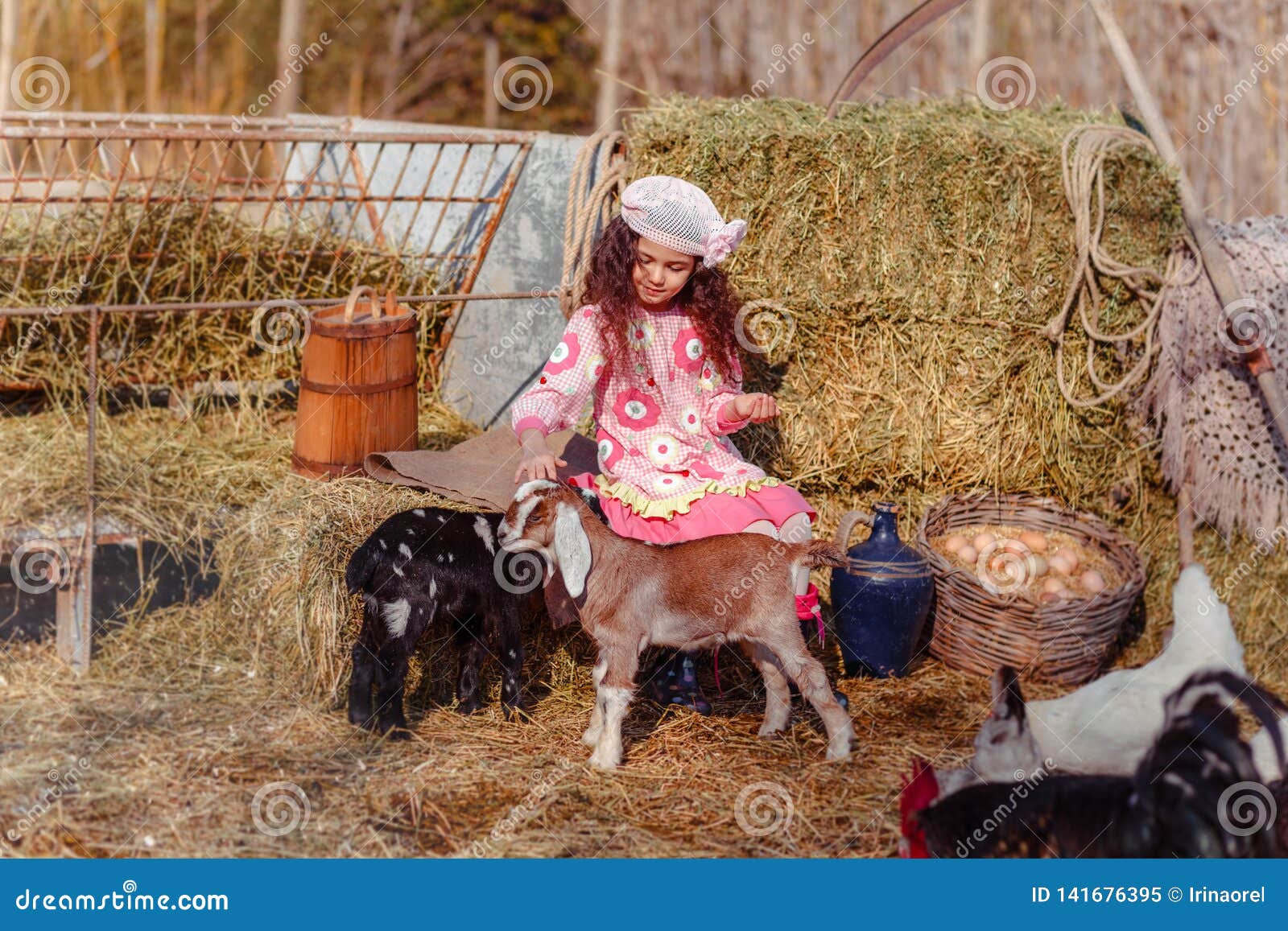 Girl with a goat 6 stock image. Image of baby, friendship - 141676395