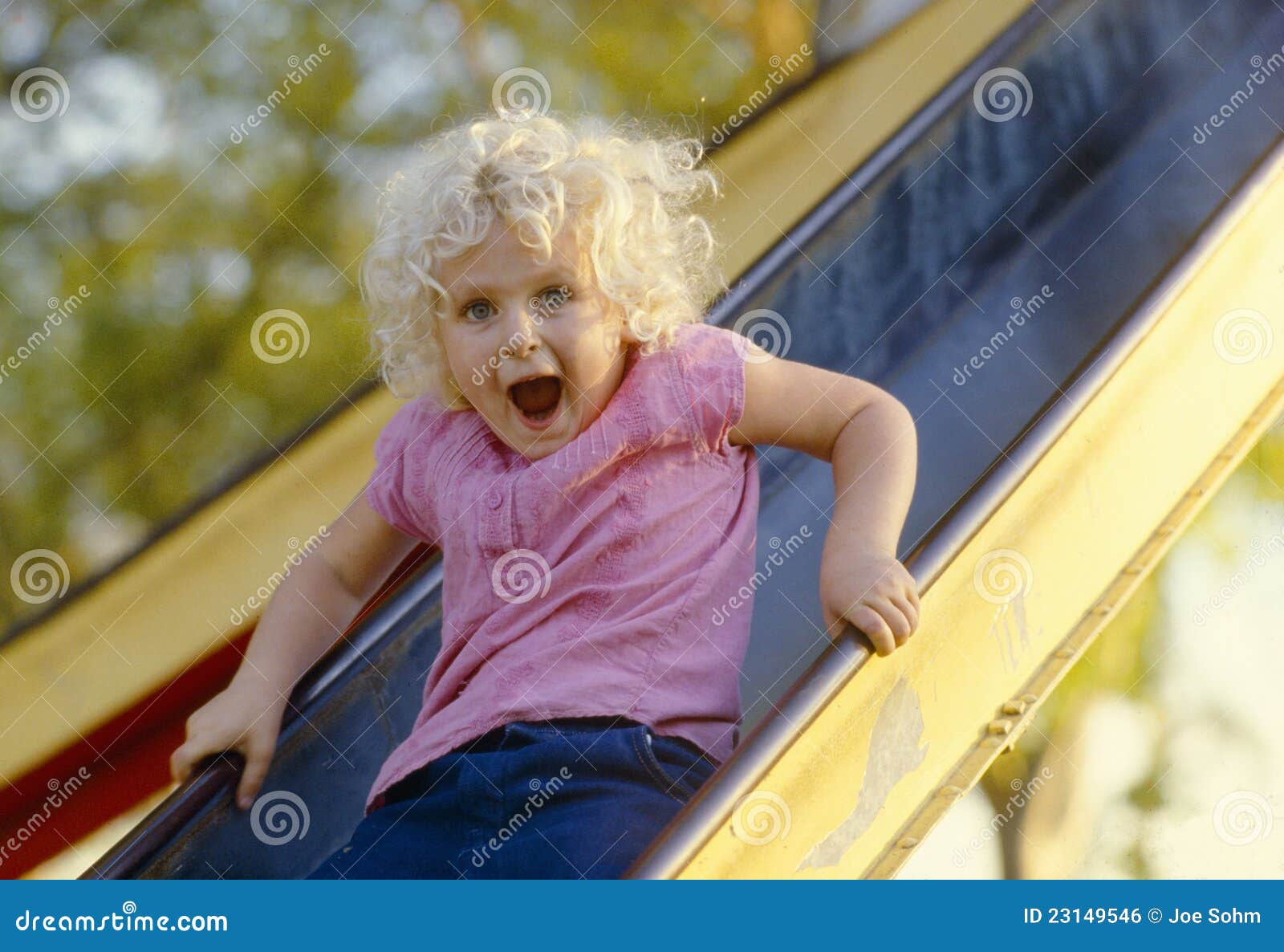 Girl Going Down Slide at a Park Editorial Photo - Image of amusement ...