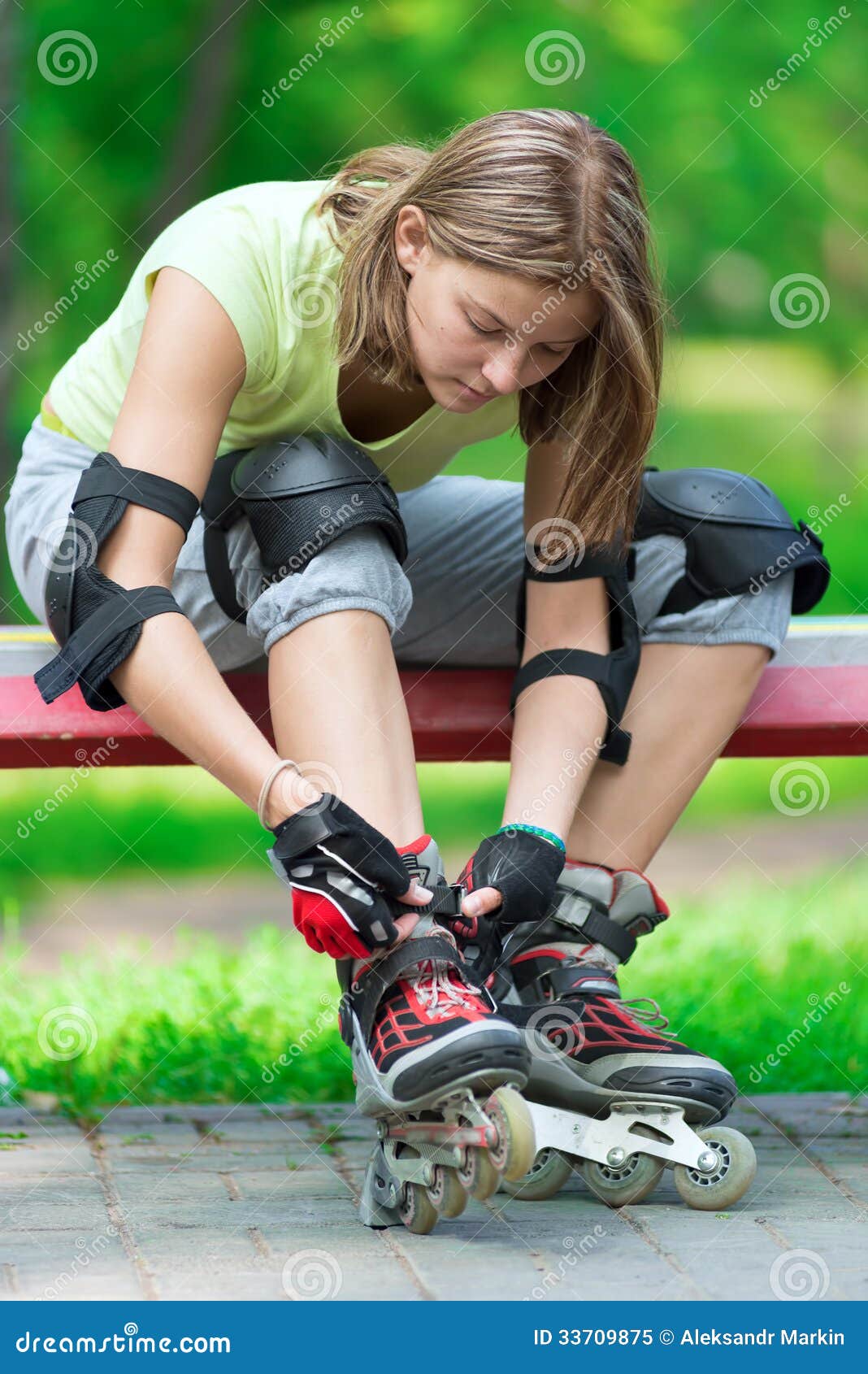 Girl Going Rollerblading Sitting in Bench Putting on Inline Skates ...