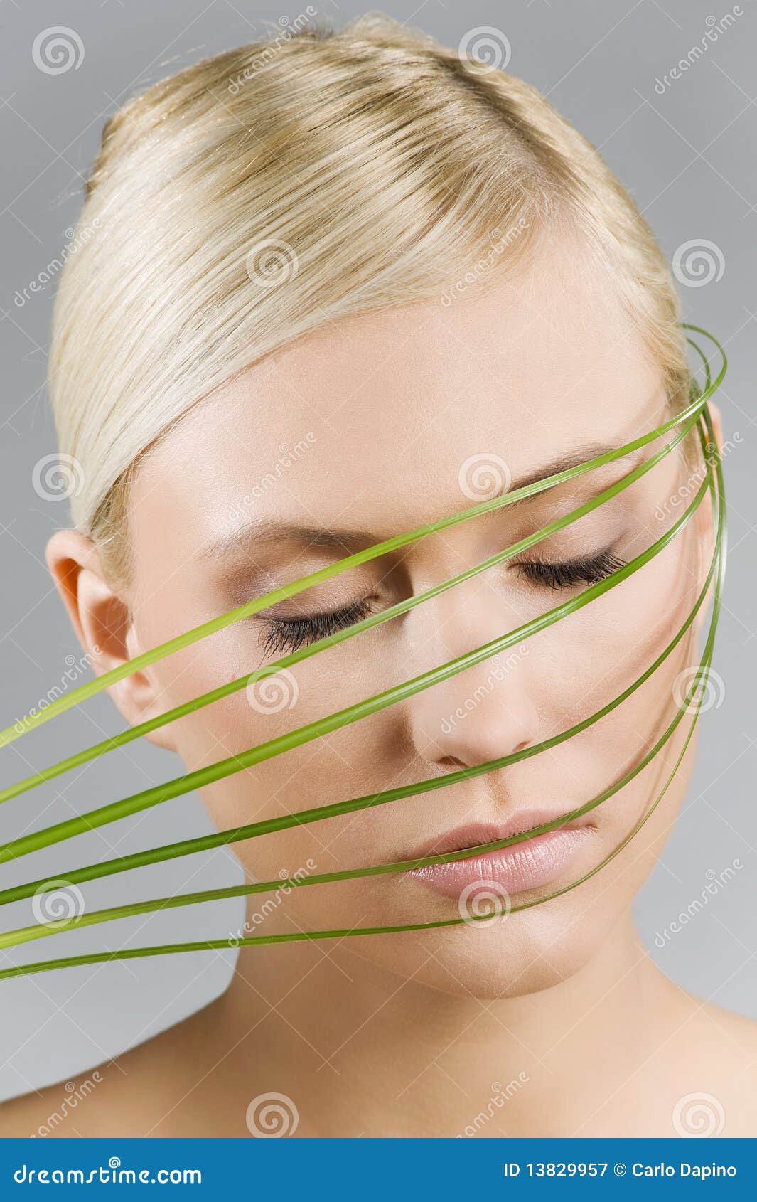 Girl with grass over face stock image. Image of face - 13829957