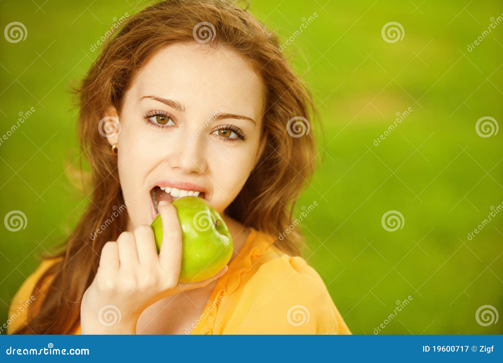 Girl with green apple stock image. Image of blurred, green - 19600717