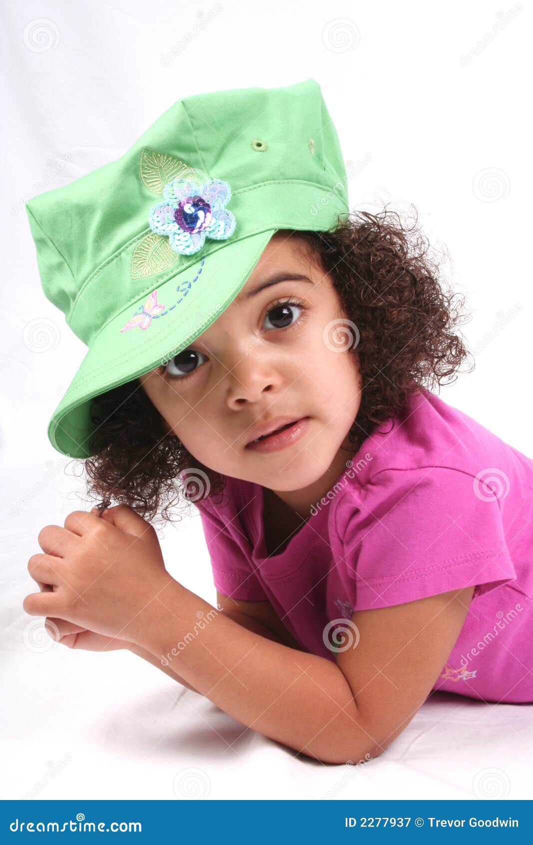 Girl in Green Hat stock image. Image of baby, brown, beautiful - 2277937