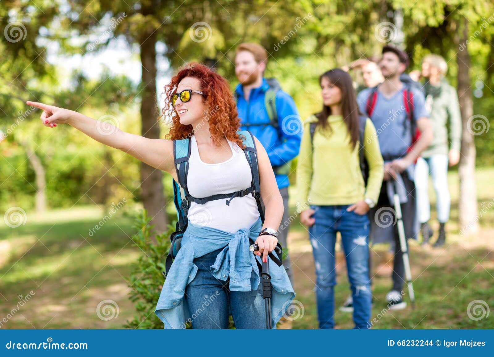 Girl in Group of Hikers Pointing Something Stock Photo - Image of ...