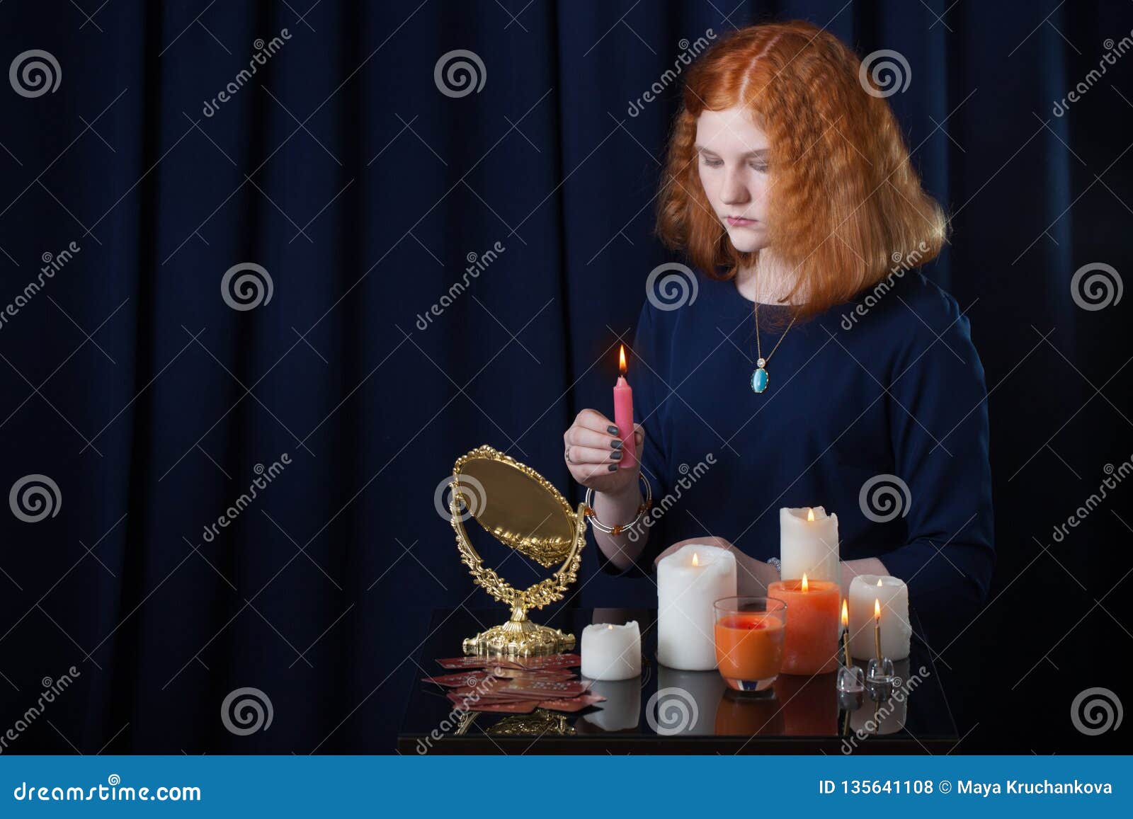 Girl Guessing with a Mirror on Blue Background Stock Photo - Image of ...