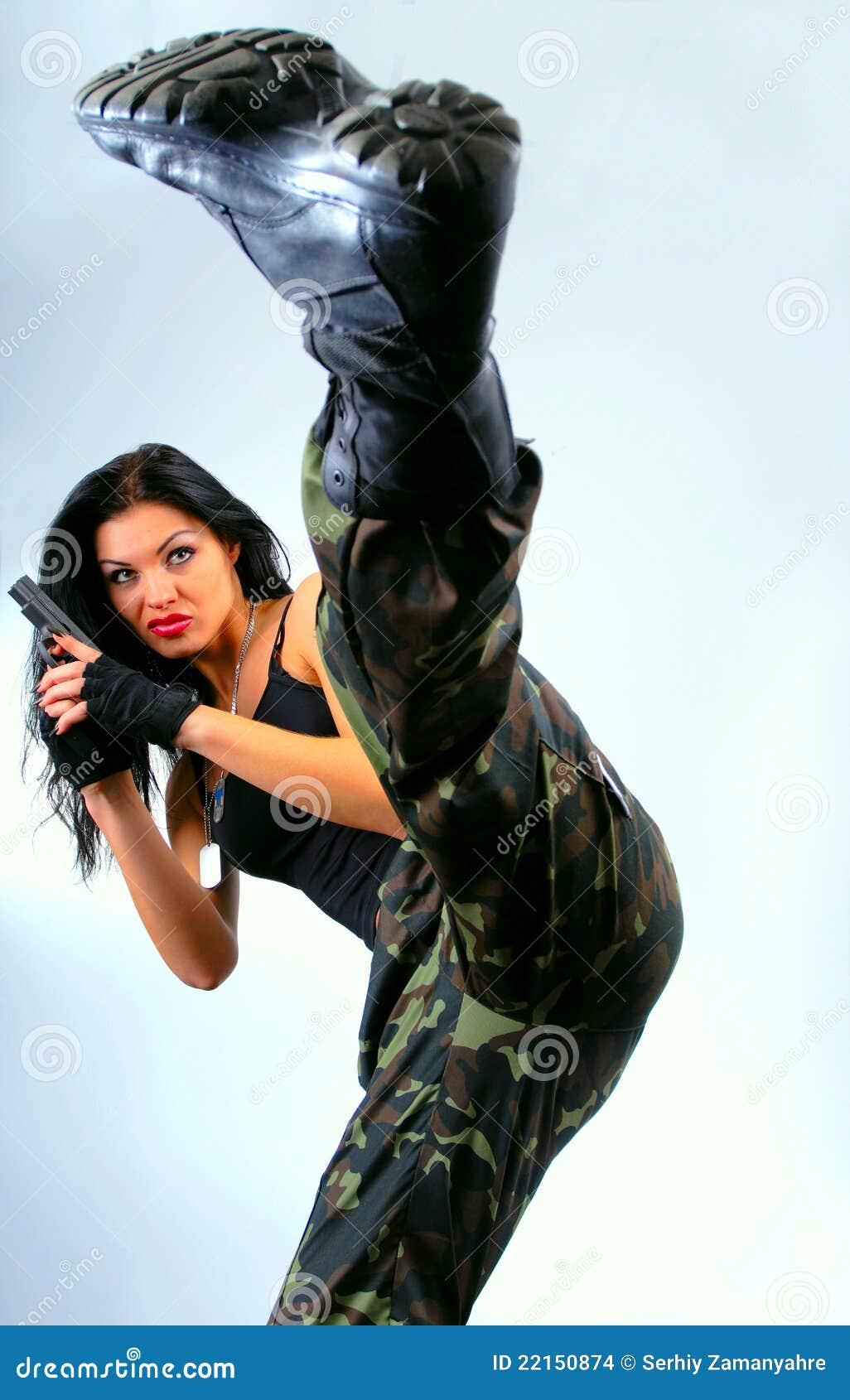 Girl with Gun in Kick Moving Stock Photo - Image of fashion, aggression ...