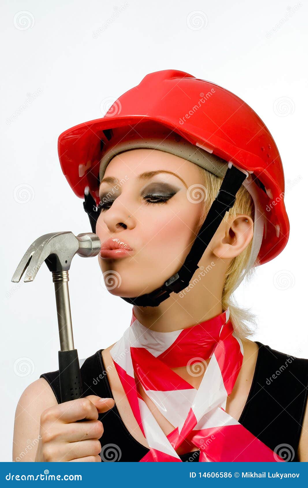 A Girl with a Hammer and a Construction Helmet Stock Photo - Image of ...