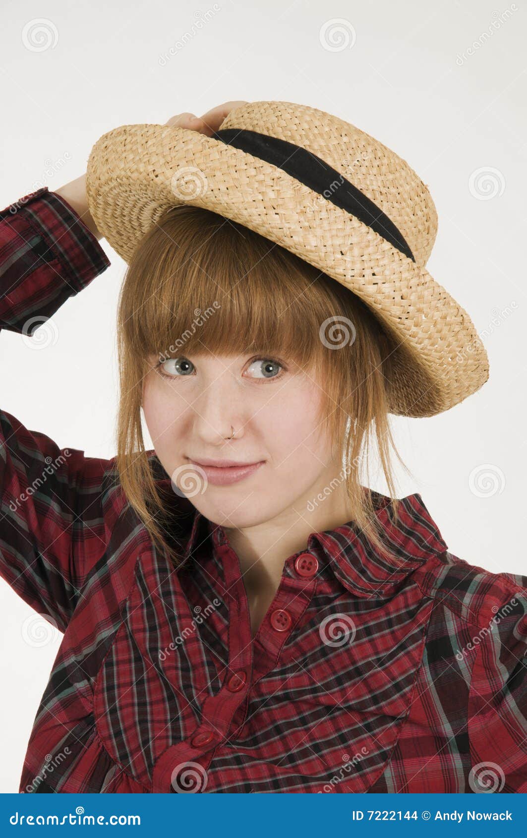 Girl with Hand on Hat Vertical Stock Photo - Image of haired, straw ...