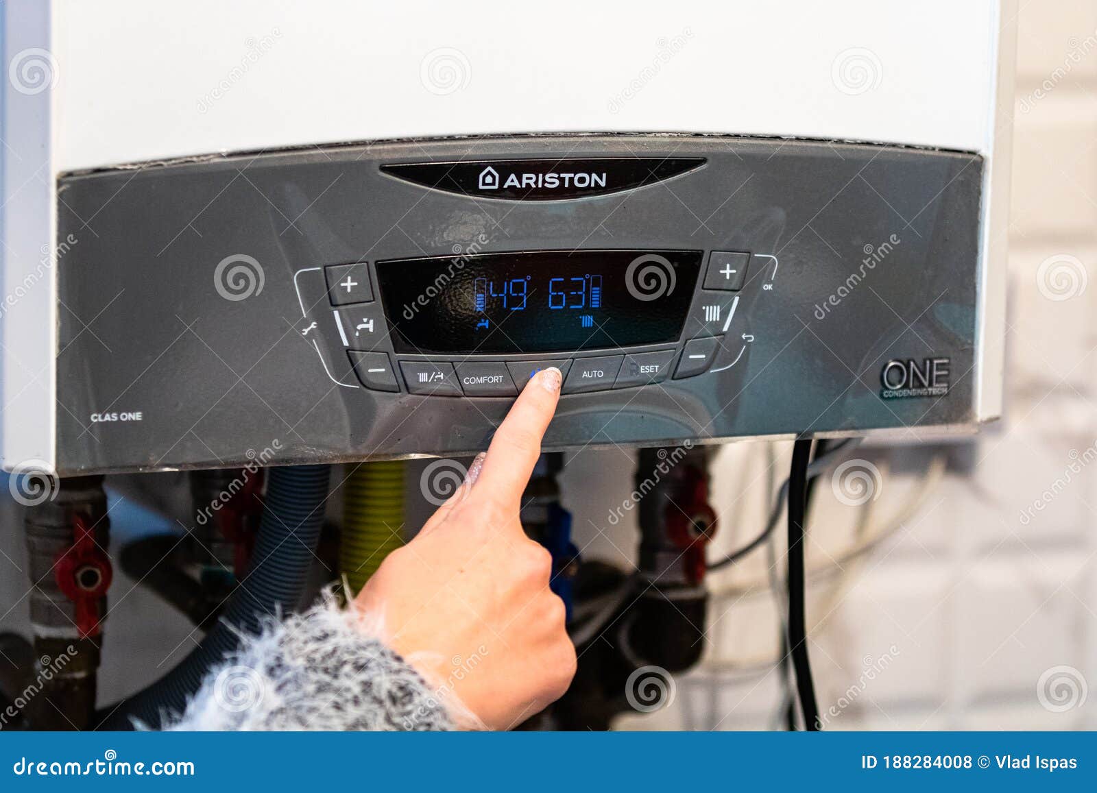 Girl Hand Setting Temperature To Heating System. Central Heating ...