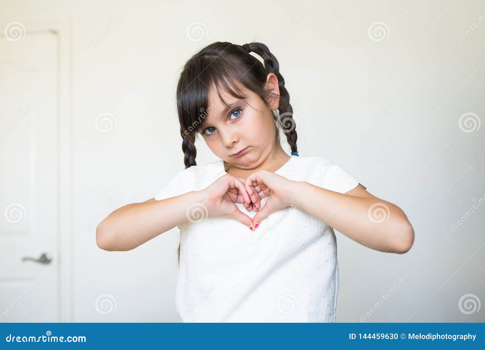 Beautiful Girl Making Heart Shape with Hands Stock Photo - Image of ...