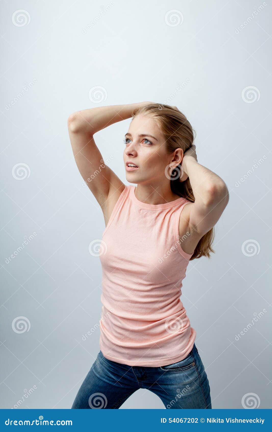 Girl with hands over head stock photo. Image of looking - 54067202