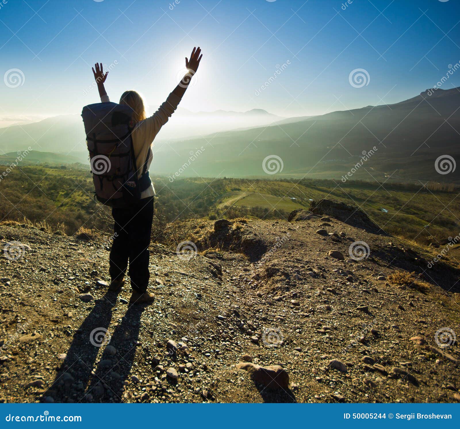 Girl with Hands Up in the Mountains Against Sun Stock Photo - Image of ...