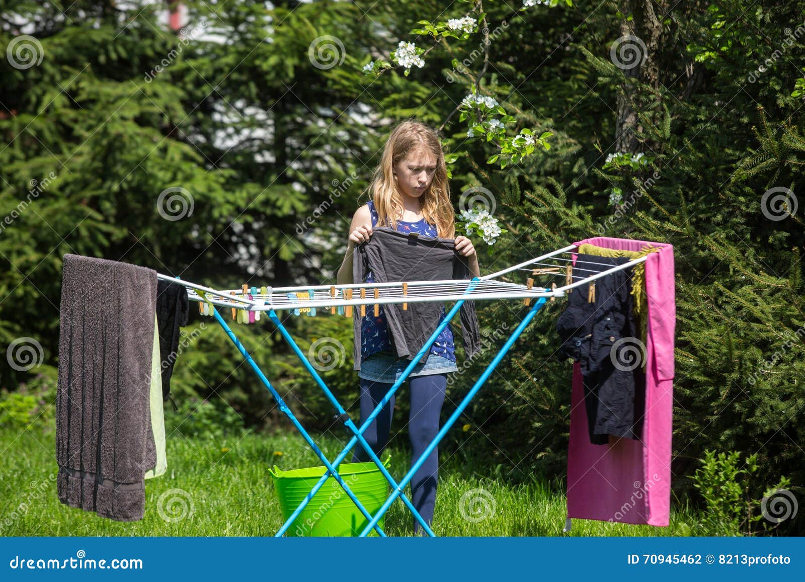 Girl Hanging Laundry in the Garden Stock Photo - Image of housework ...
